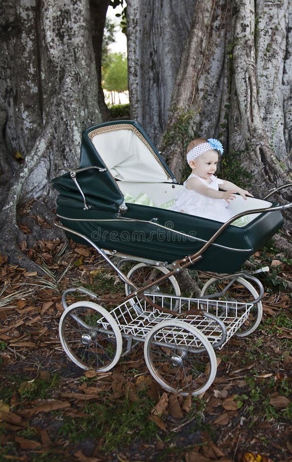 Baby in carriage stock photo. Image of cute, girl, baby - 20714110