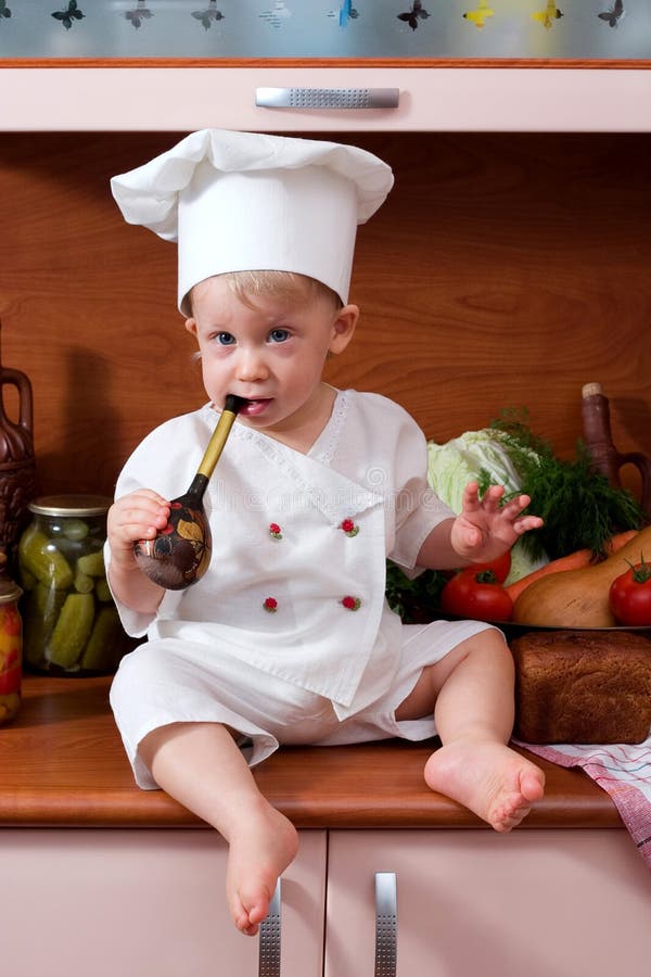 Cute Chubby Baby Chef in a Cooking Pot Looking Dow Stock Image - Image ...