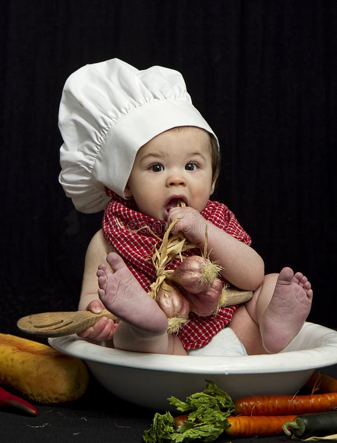 Baby Chef Eating stock photo. Image of peppers, spoon - 29461172