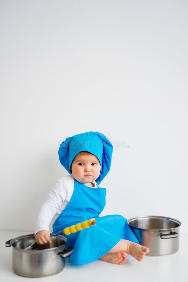 Baby in chef hat stock image. Image of sitting, portrait - 106726071