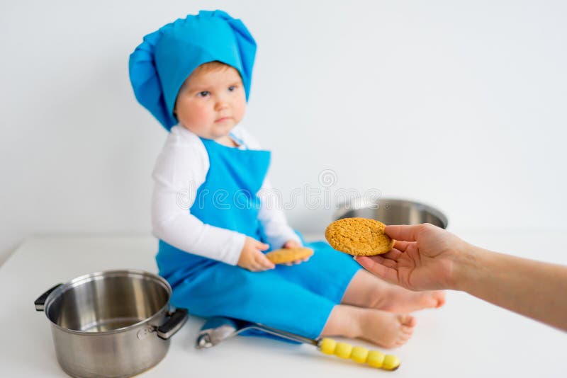 Baby in chef hat stock image. Image of ladle, beautiful - 106726187