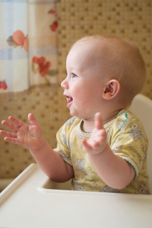 Baby is clapping hands stock image. Image of expressing - 11449455