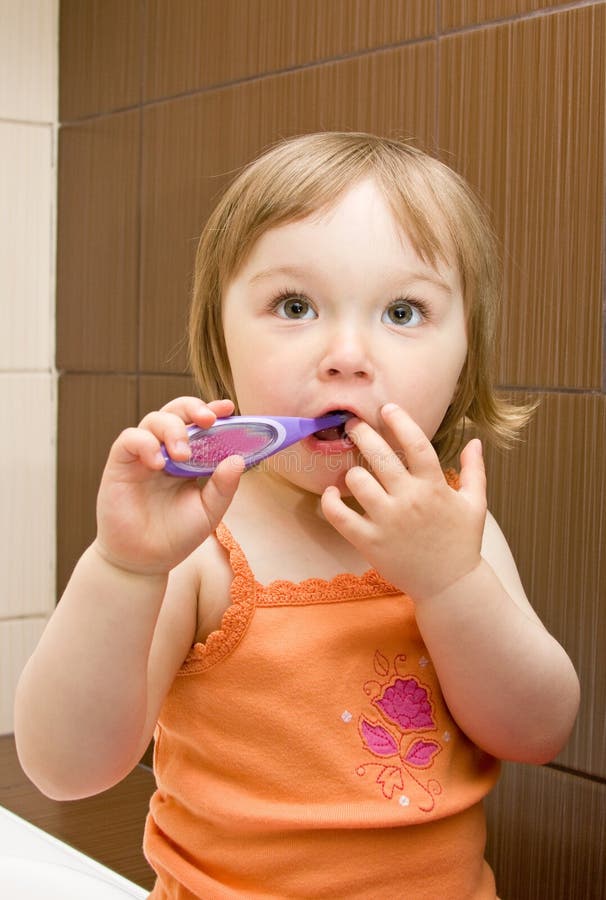 Baby cleaning teeth stock photo. Image of medicine, baby - 9933170
