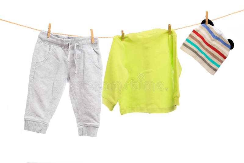 Baby Clothes on a Clothesline on White Background Stock Image - Image ...