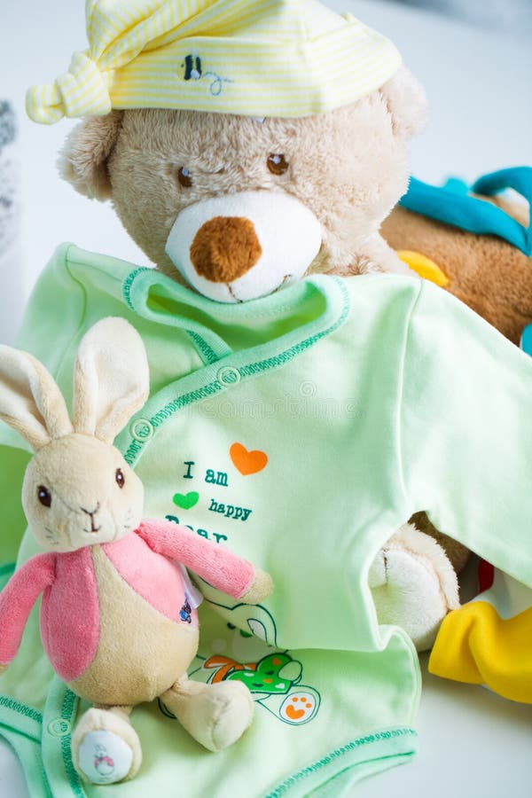 Baby clothes and toys stock photo. Image of color, animal - 70646860