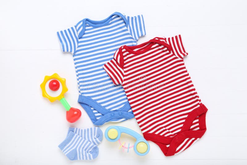 Baby clothes with toys stock image. Image of design - 156584077
