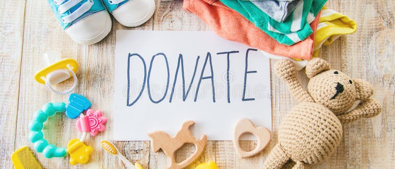 Baby Clothing and Donation Accessories. Selective Focus Stock Photo ...