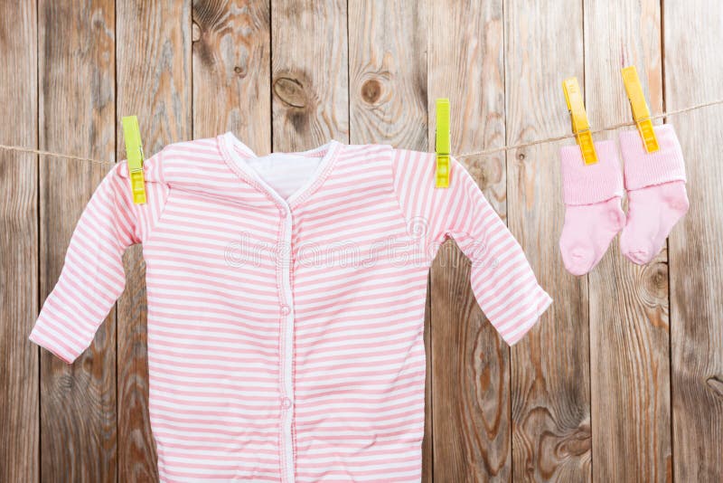 Baby Clothing on a Clothesline Stock Photo - Image of clothesline ...