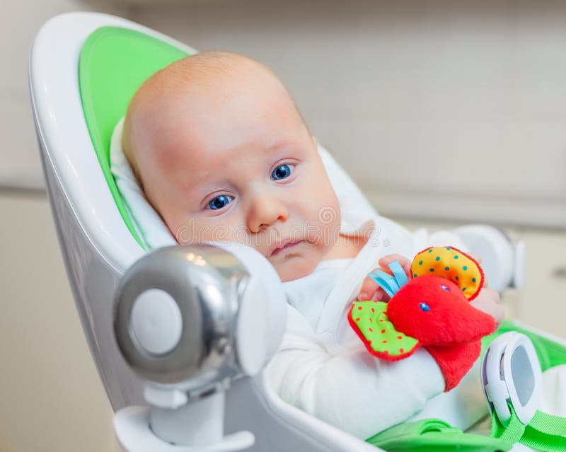 Baby clutched colorful toy stock image. Image of beautiful - 29094443