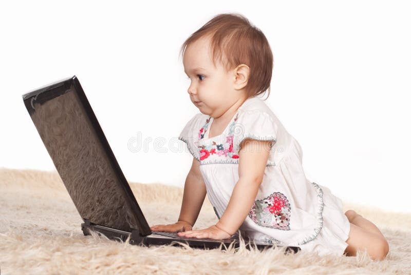 Baby with computer stock image. Image of pleasure, caucasian - 20698457