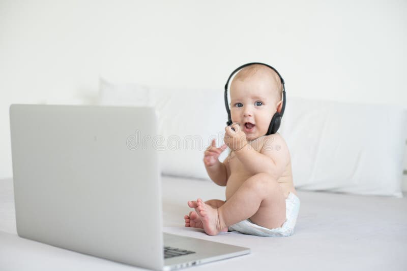 Baby with computer stock image. Image of pleasure, caucasian - 20698457