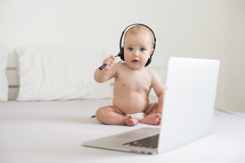 A Baby and a Computer, Head Shot Laptop Stock Photo - Image of back ...