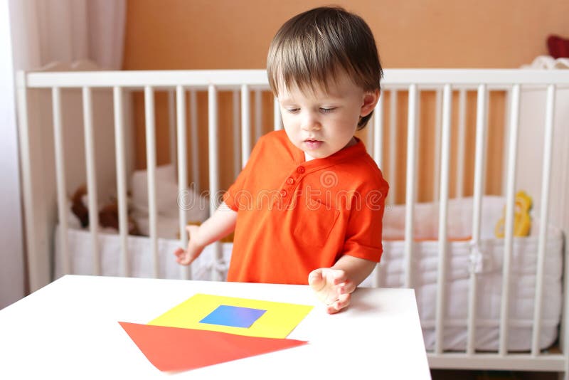 Baby Constructing House of Paper Details Stock Image - Image of ...