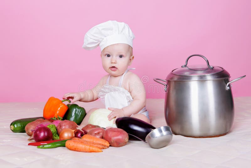 Baby Cook Girl Wearing Chef Hat with Fresh Vegetables and Fruits. Stock ...
