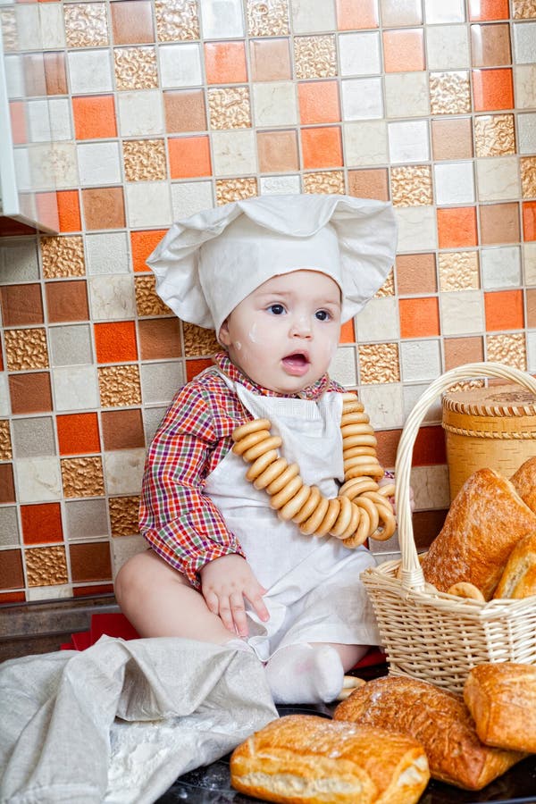Baby Cook Girl Wearing Chef Hat with Fresh Vegetables and Fruits. Stock ...