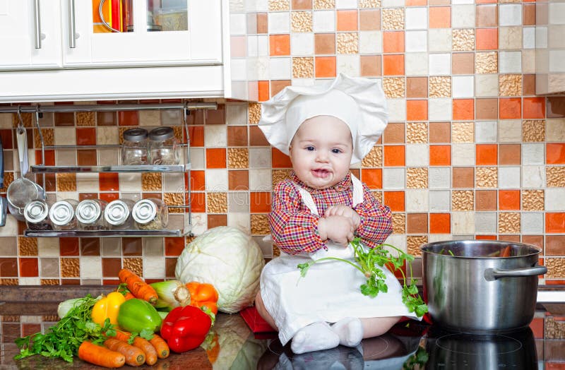 Baby cook with vegetables stock image. Image of female - 28863291