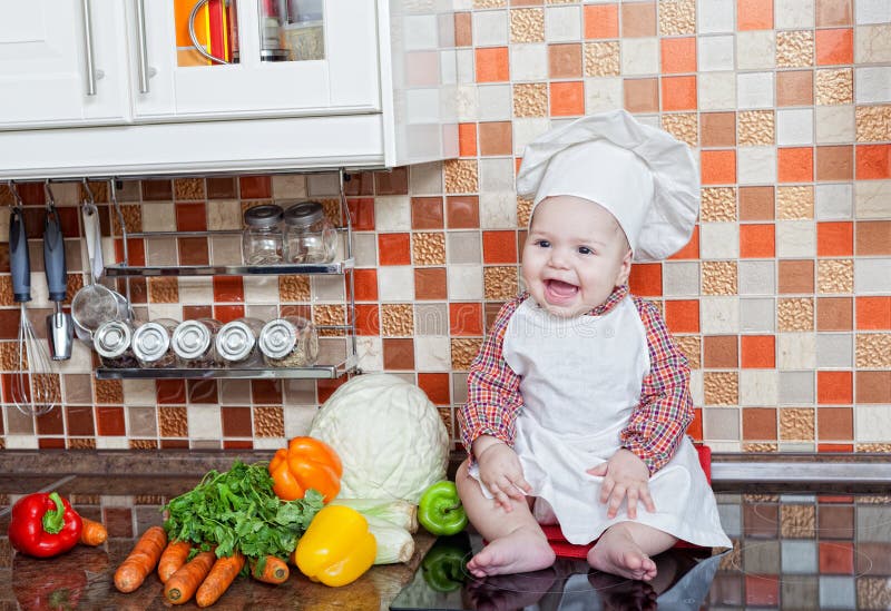 Baby cook with vegetables stock image. Image of diet - 30965157