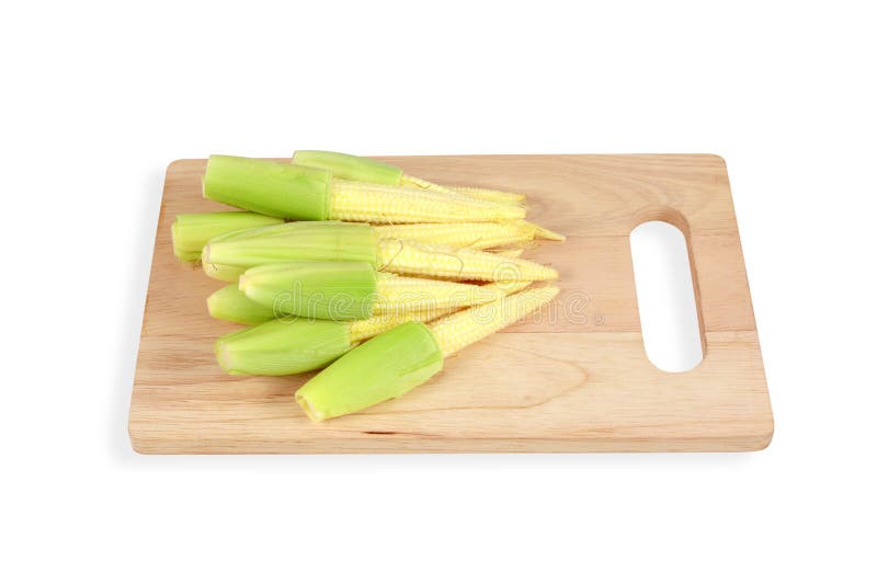 Baby Corn on Wooden Cutting Board Isolated Stock Photo - Image of ...