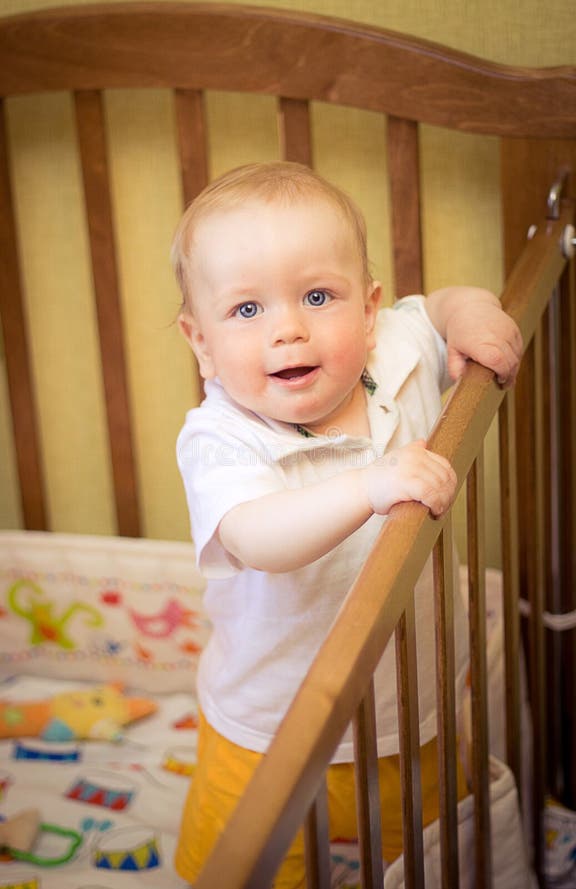 Baby in cot stock photo. Image of baby, room, smiling - 21626970