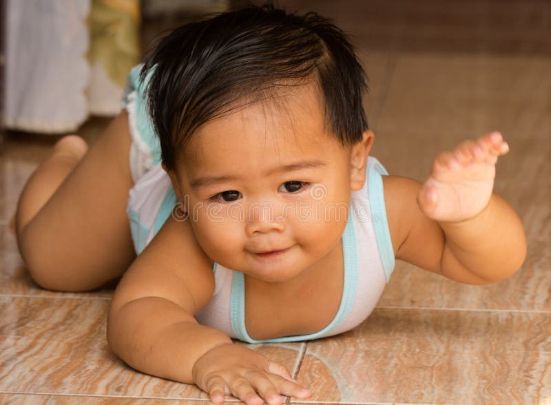 Baby crawling stock image. Image of crawling, balance - 26365777