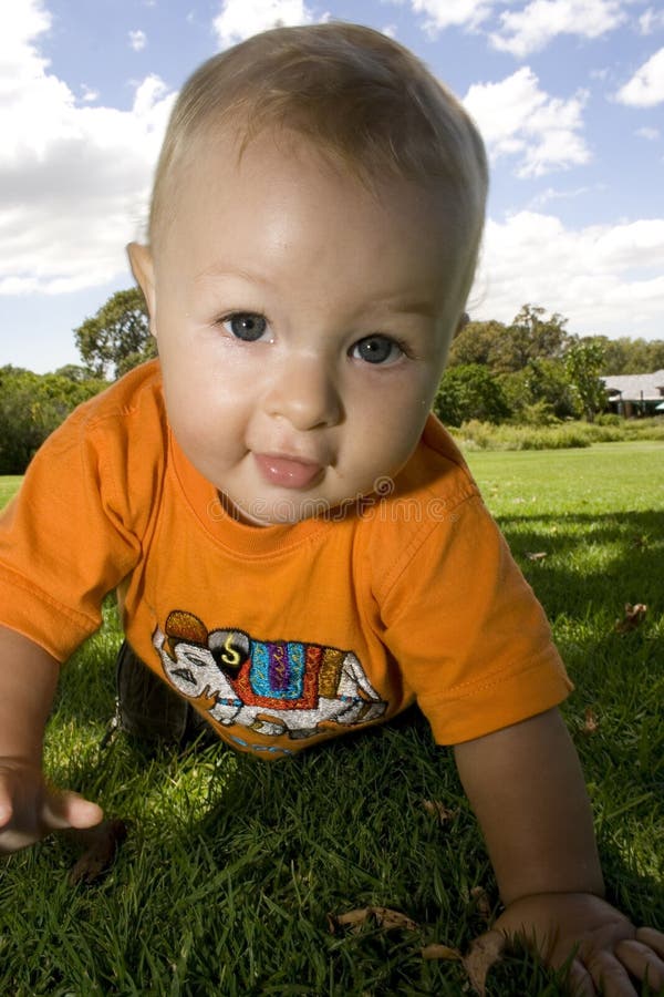 Cute Baby Crawling on Grass Stock Photo - Image of children, crawl: 2026286