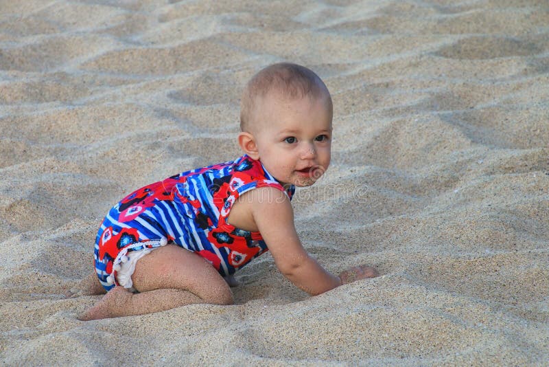 Baby Crawling in a Soft Beach Sand Stock Photo - Image of little ...
