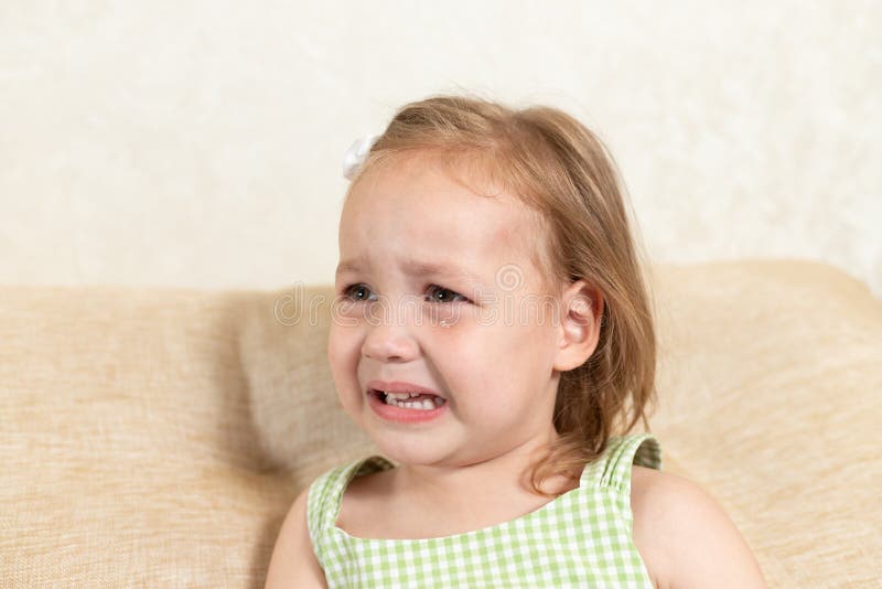 The Baby is Crying. the Child is Upset. Tears on Eyes Stock Photo ...