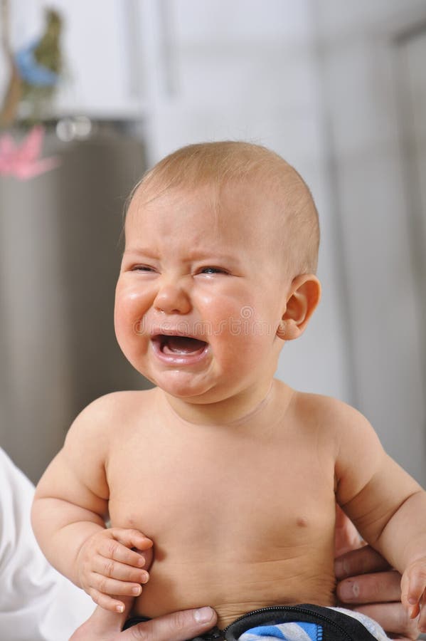 A Dentist Examines the Baby Teeth in the Boy. the Loss of Milk Teeth ...
