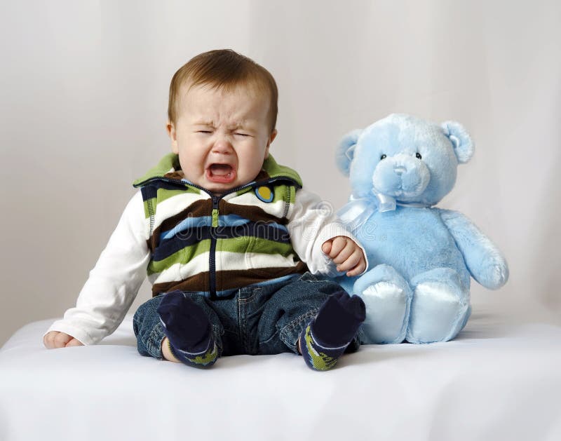 Baby Crying with Teddy Bear Stock Image - Image of teddy, emotion: 14236305