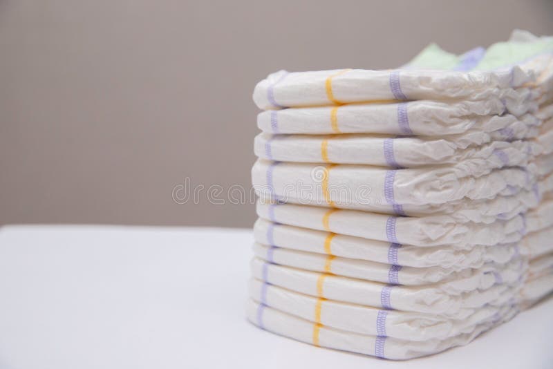 Baby Diapers in a Stack on a White Background Stock Photo - Image of ...