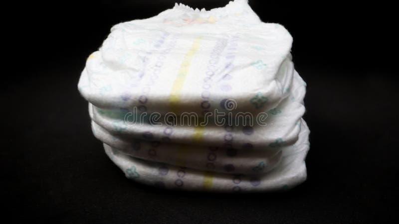 Stack of Baby Diapers on a Shelf. Stock Photo - Image of toddler ...