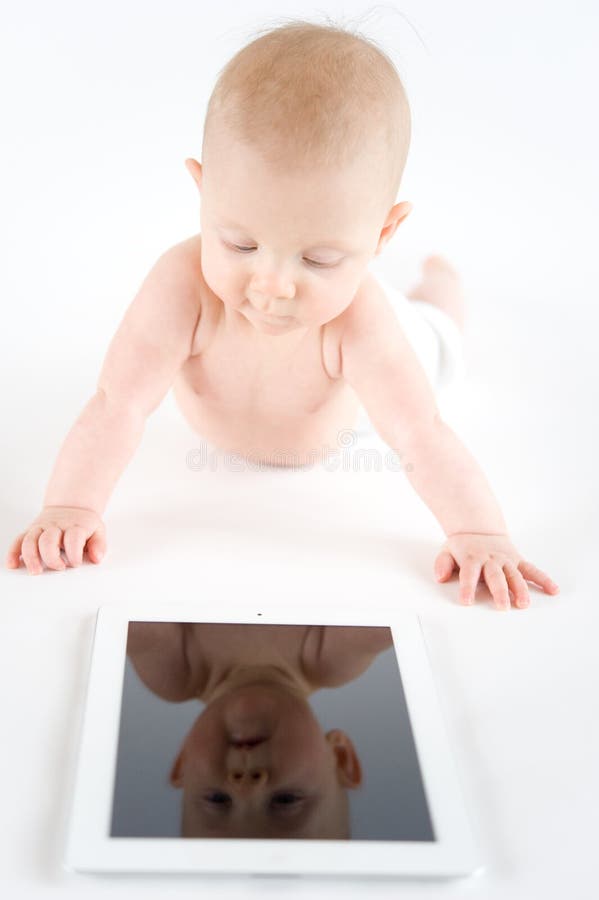 Baby with digital tablet stock image. Image of playful - 28863703