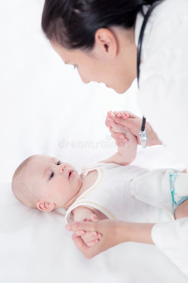 Doctor Giving Checkup To Baby in Exam Room Stock Image - Image of ...