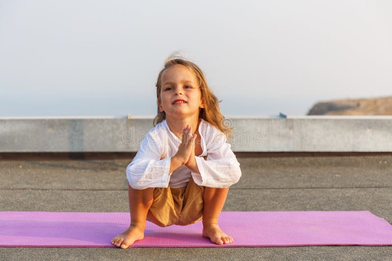 Baby Doing Yoga on the Roof Stock Photo - Image of balance, caucasian ...