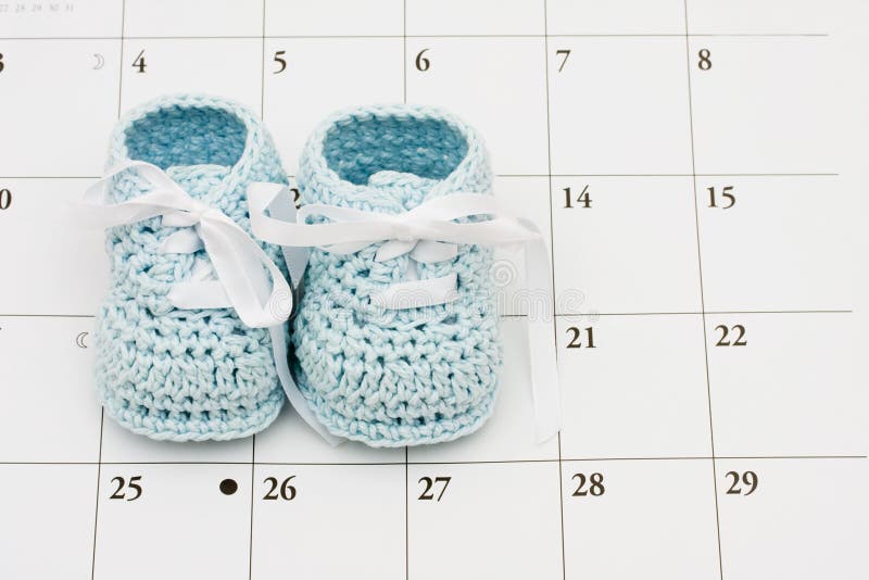 Baby s due date stock photo. Image of footwear, foot, booties - 3308192