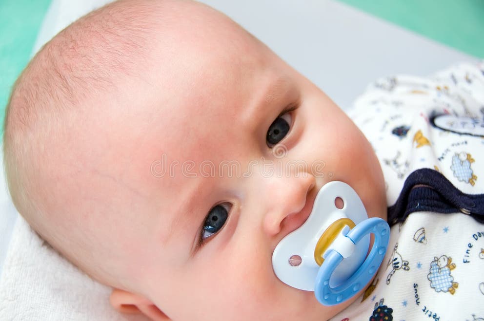 Baby with dummy - pacifier stock image. Image of expressions - 8276143