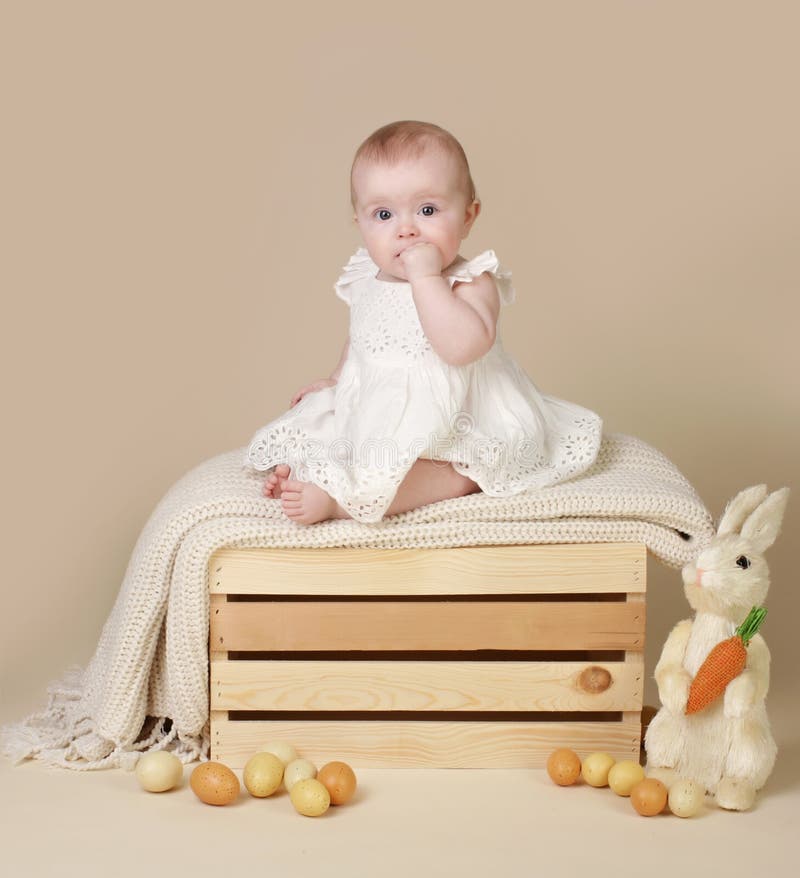 Baby Easter Bunny Eggs stock image. Image of serious - 39453709