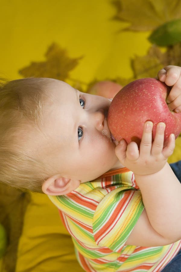 Mother Feeding Baby with Daughter Eating Stock Photo - Image of female ...