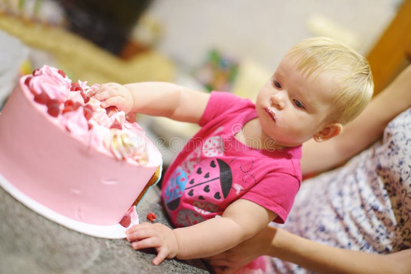 Baby eating birthday cake stock photo. Image of happiness - 125242290