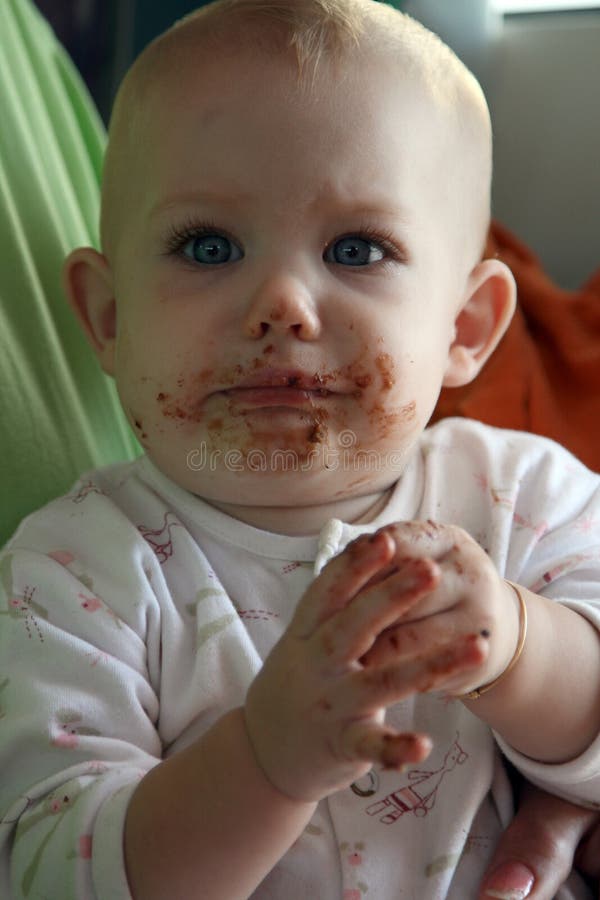 Baby eating a cookie stock image. Image of chocolate, baby - 7535237