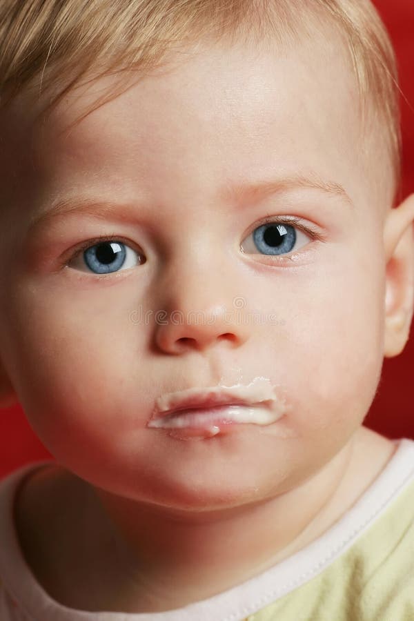 Baby Eating Food on the Face Stock Photo - Image of face, eyes: 10108276