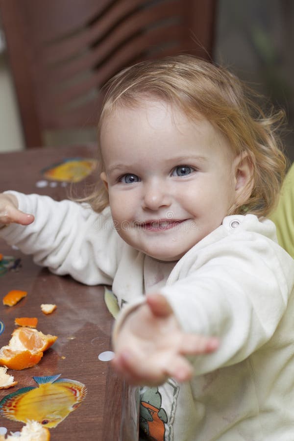 Baby eating mandarins stock photo. Image of fruit, clean - 22841262