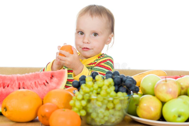 Baby Eats Fruit on a White Background Stock Image - Image of healthy ...