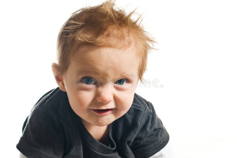 Baby with Evil Facial Expression Stock Photo - Image of hair, cute ...