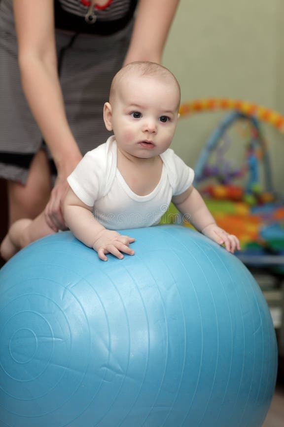 Baby exercises on ball stock image. Image of cute, health - 23688975