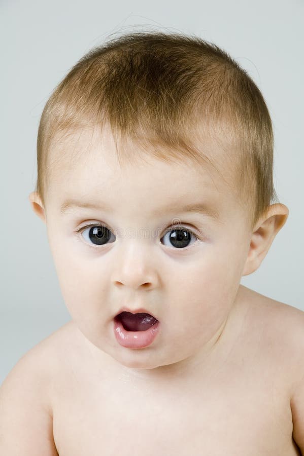 Baby with Expressive Face stock image. Image of girl - 16883339