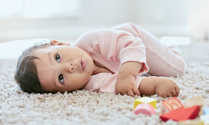 Baby, Face and Relax on Carpet in Home with Building Blocks for ...