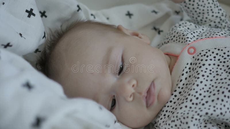 Baby falling asleep stock footage. Video of charming - 100788060