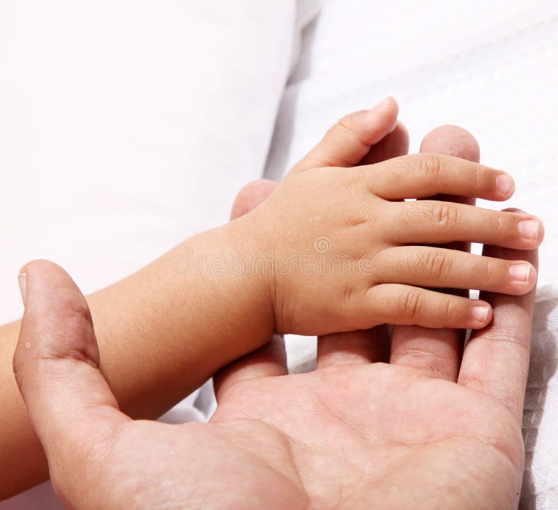 Father and Baby Hand stock photo. Image of hold, infant - 23172122