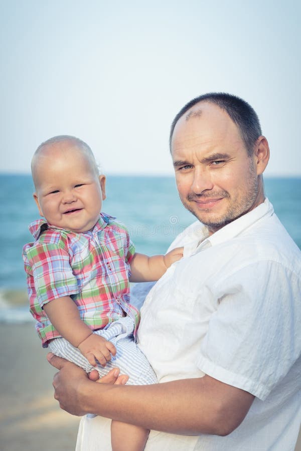 Baby and father stock image. Image of beautiful, baby - 39175651